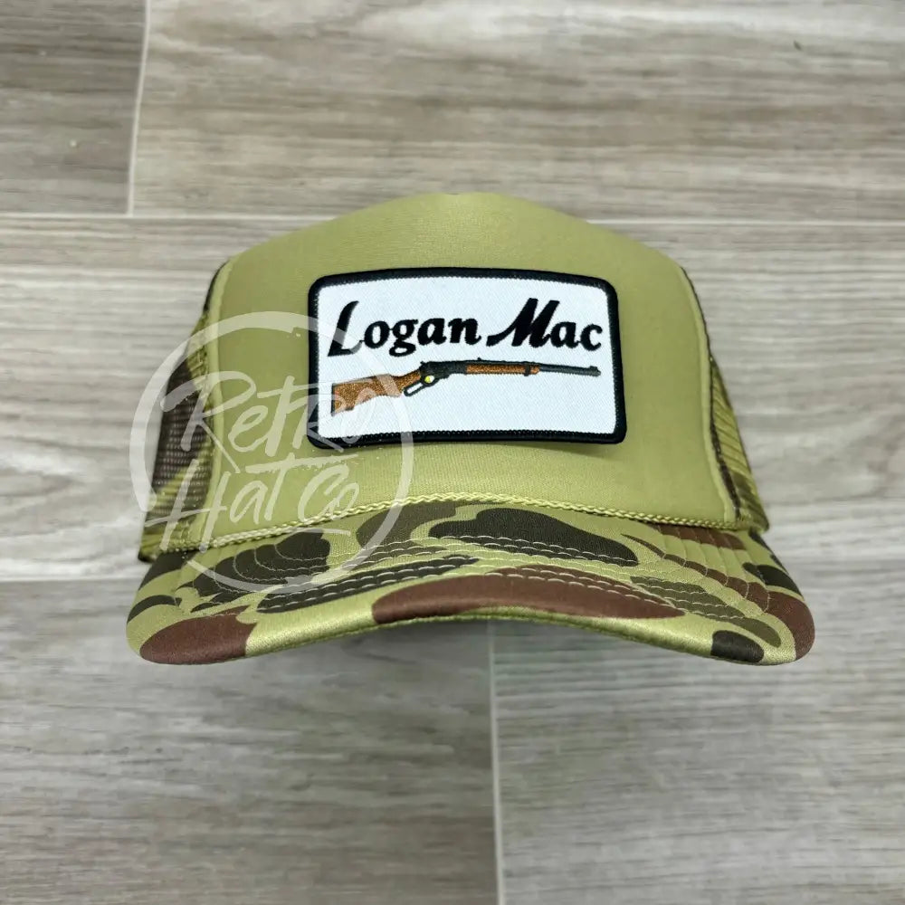 Logan Mac Rifle Patch on Solid Front Camo Meshback Trucker Hat