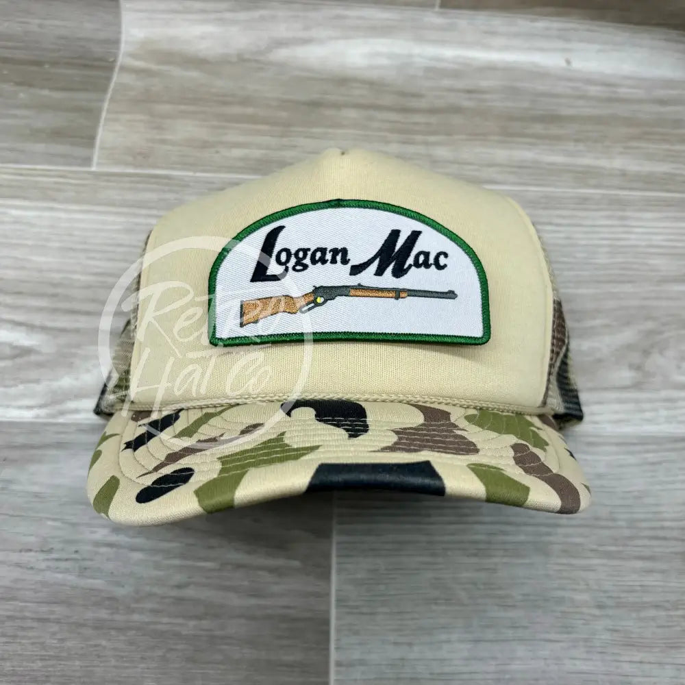 Logan Mac Rifle Patch on Solid Front Beige / Camo Meshback Trucker Hat