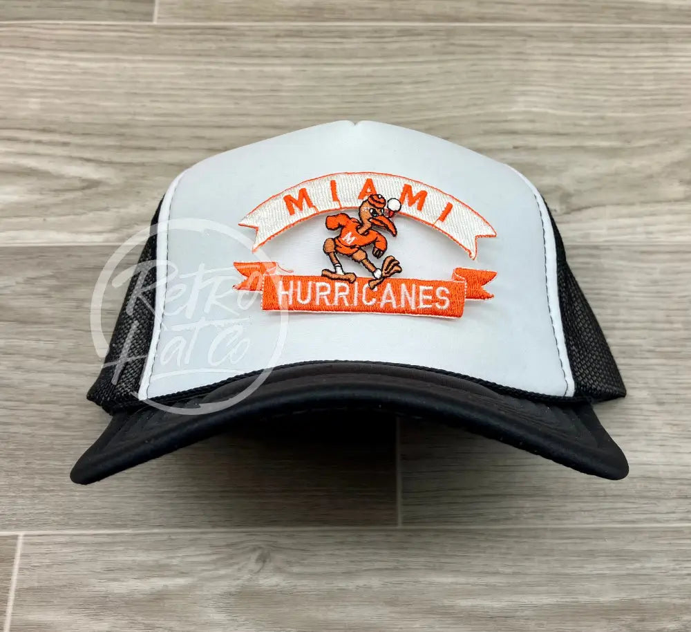 Vintage 90s Miami Hurricanes Patch on Black/White Meshback Trucker Hat